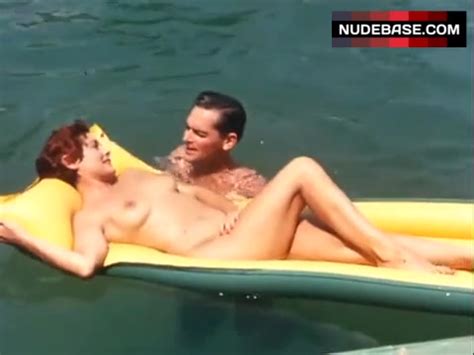 Dolores Carlos Lying Naked On Air Mattress Hideout In The Sun