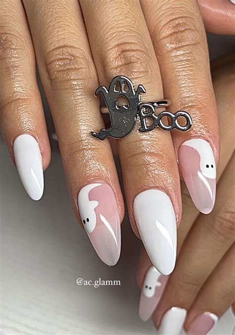 30 Spooky Halloween Nail Ideas White And Sheer Nails With Ghost I