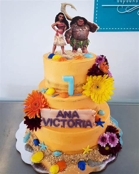 There Is A Cake That Has Two People On It