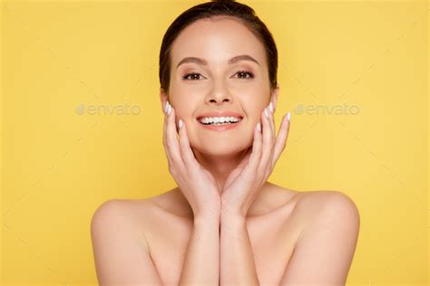 Happy Beautiful Naked Woman With Perfect Skin Touching Face Isolated On