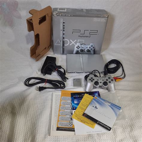 playstation 2 slim prata scph 77001 na caixa cib Escorrega o Preço