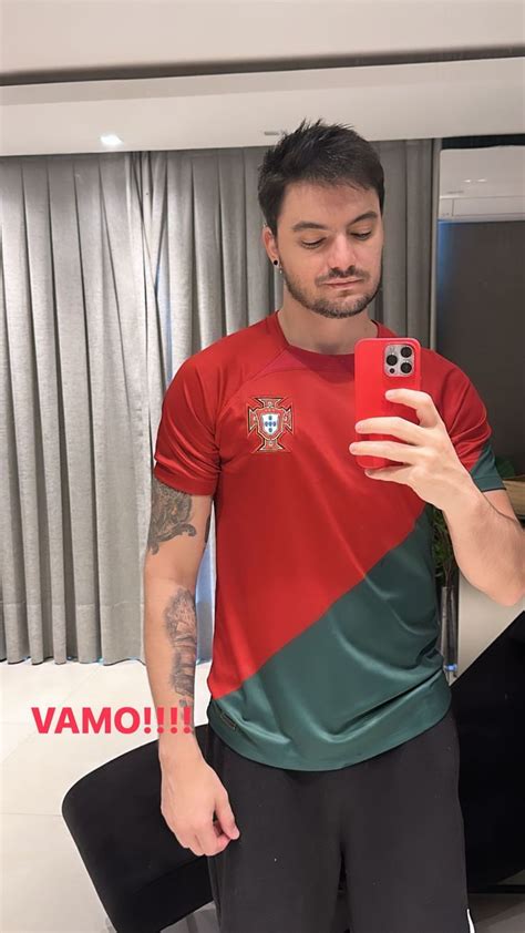 A Man Taking A Selfie With His Cell Phone
