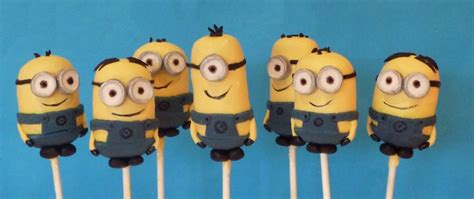 Five Minion Lollipops Are Lined Up In The Shape Of Three Men