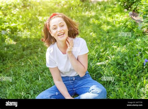 Happy Girl Smiling Outdoor Beautiful Young Brunete Woman With Brown Hair Resting On Park Or