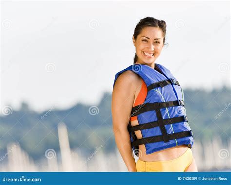 Woman Wearing Life Jacket At Beach Stock Image Image Of Recreation