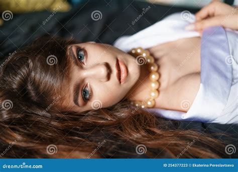 Beautiful Seductive Young Brunette Woman With Big Beads In A White Blouse Stock Image Image Of