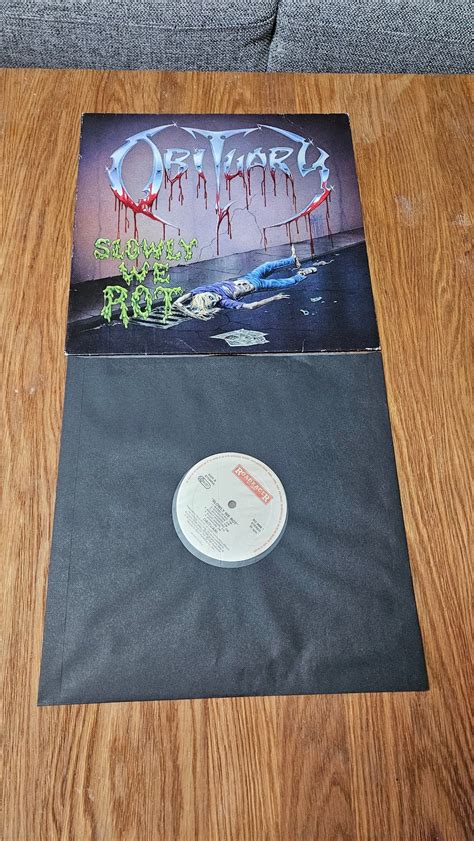Se produkter som liknar Obituary Slowly We Rot på Tradera 619214439