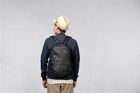 Premium Photo Rear View Of Male Hiker With Backpack Isolated On White