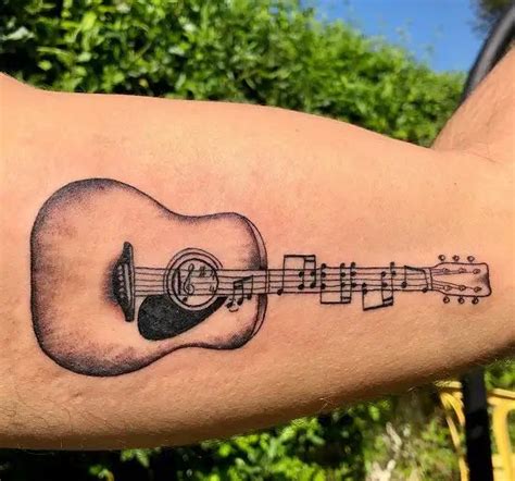15 Best Guitar Tattoo Designs With Meanings Guitar Tattoo Design