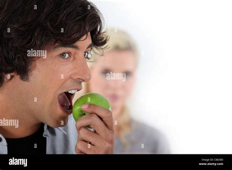 Man Eating Apple Stock Photo Alamy