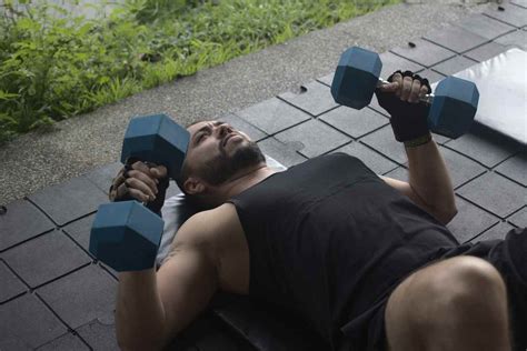 5 Dumbbell Chest Exercises Without A Bench Plus Sample Workout