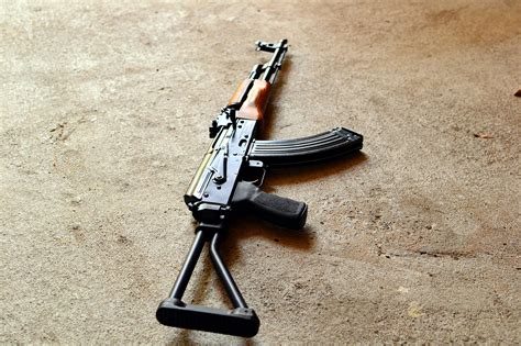 HD Wallpaper Of A Man Made AK 47