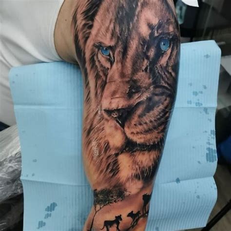 Tatuaż sawanna Autor Lucky Tattoo dziarownia pl