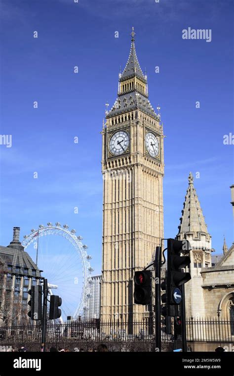 The Elizabeth Tower Big Ben With The London Eye In The Background