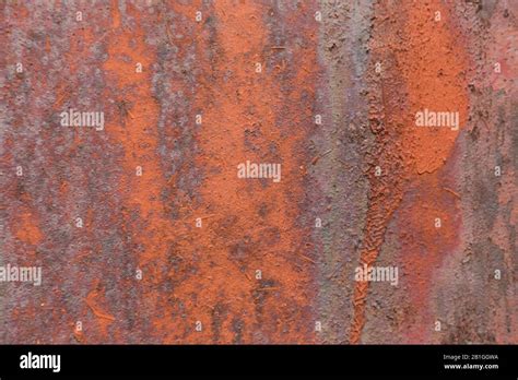Rusty Metal Wall Old Sheet Of Iron Covered With Rust With Paint