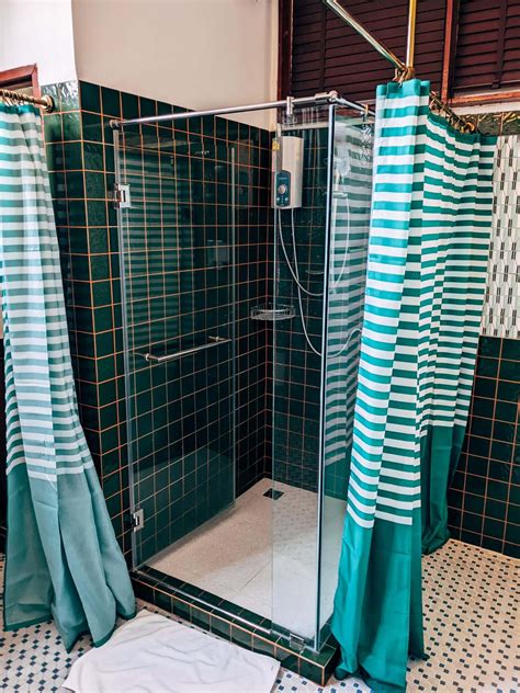 Should Shower Curtains Touch The Floor