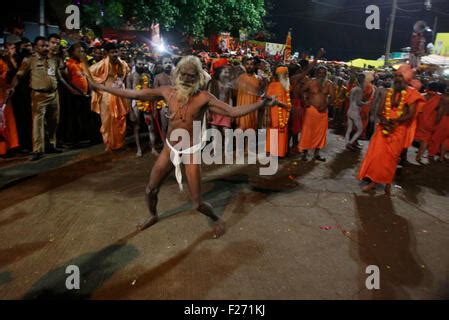 Naked Naga Sadhus Taking A Holy Bath During The Kumbha Or Kumbh Mela In