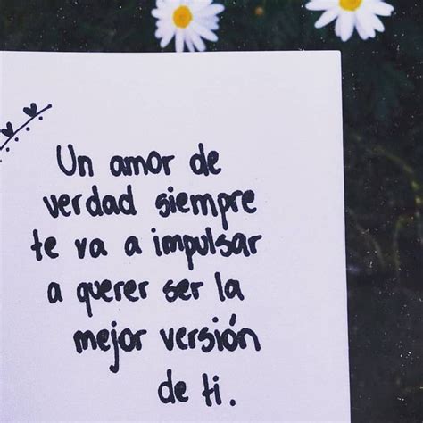 A Piece Of Paper With Writing On It Next To Some Daisies And Flowers In