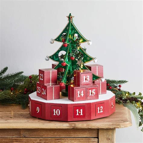 Lights4fun Calendrier de lAvent Lumineux en Forme de Sapin de Noël 3D