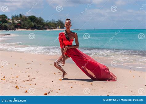 Woman Wearing Red Bikini And Dress On A Tropical Beach Remote Tropical Beach In Barbados