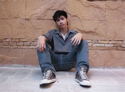 Asian Man Sitting