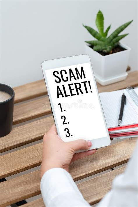 Sign Displaying Scam Alert Word Written On Warning Someone About