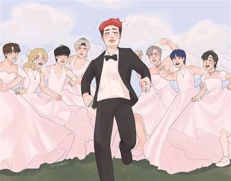 A Man In A Tuxedo Standing Next To A Group Of Women Wearing White Dresses