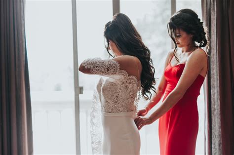 Maid Of Honor Zipping Up The Bride Heres Your Wedding Day Photo Checklist Popsugar Tech Photo 4