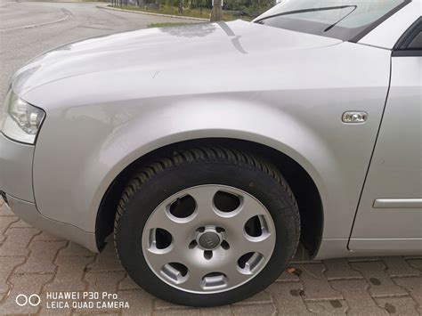 Błotnik LEWY do AUDI A4 B6 LY7W 12669683035 oficjalne archiwum Allegro