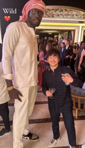 F1 Fans In Hysterics After 5ft 3in Driver Yuki Tsunoda Poses Alongside