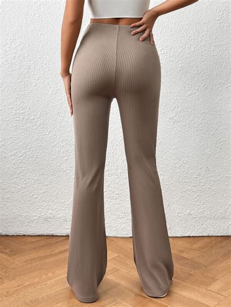SHEIN Essnce Ribbed Knit Overlap Waist Flare Leg Pants SHEIN USA