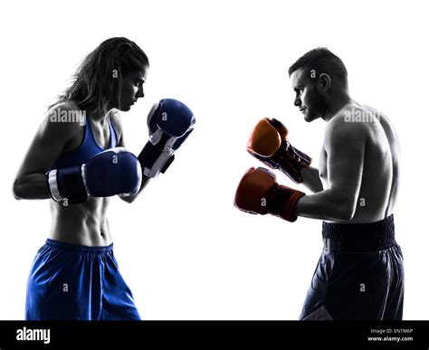 One Woman Boxer Boxing One Man Kickboxing In Silhouette Isolated On