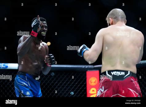 SAN ANTONIO TEXAS MARCH 25 L R Chidi Njokuani Battles Albert