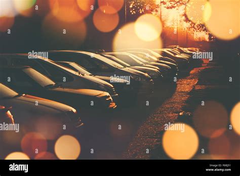 Rows Of Cars Parked In Residential District In Sunset Retro Toned