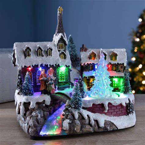 The Seasonal Aisle Pre Lit LED Musical Animated Christmas Village Scene