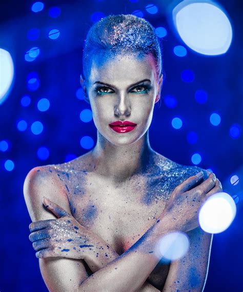 Premium Photo Portrait Of Naked Woman With Glitter Against Blue