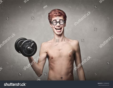 Naked Nerd Guy Raising A Dumbbell Stock Photo Shutterstock