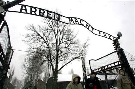 Naked Protesters Kill Sheep At Auschwitz