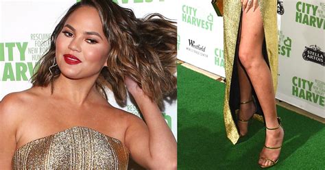 Chrissy Teigen Suffers Wardrobe Malfunction In Crotch Flashing Dress
