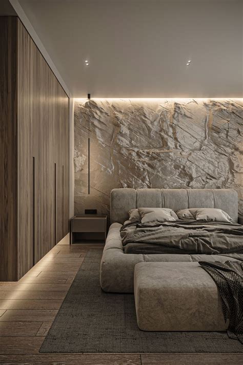 A Large Bed Sitting In The Middle Of A Bedroom Next To A Wooden Cabinet