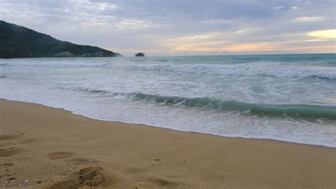 Beautiful Sea Waves And White Sand Beach In The Tropical Island
