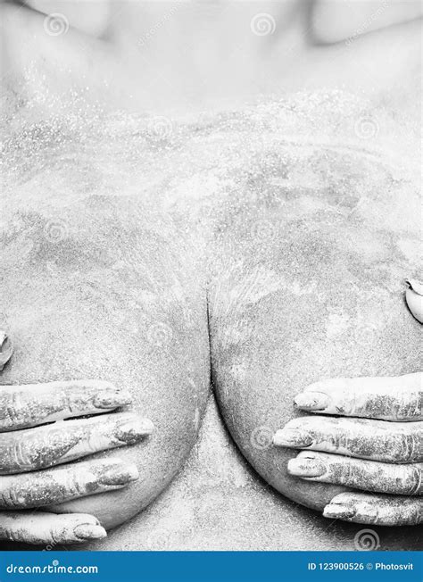 Topless Woman Body Covering Her Breast With Hands Smeared In Golden