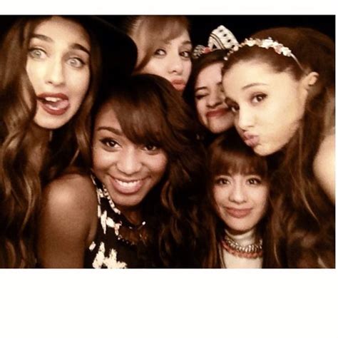 A Group Of Girls Posing For A Photo Together