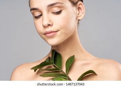 Beautiful Woman Naked Shoulders Green Leaves Stock Photo 1487137043