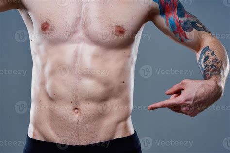 Male Athlete With Cubes On His Stomach Naked Torso Tattoo Bodybuilders