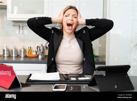 Desperate Overworked Businesswoman Screams And Shouts In The Kitchen