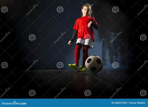 The Girl Football Player Is Having Fun With The Ball Indoors Stock Image Image Of Juggling