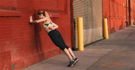 Wall Pushups How To Do This Modified Pushup Variation