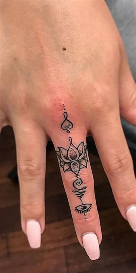 10 Awesome Ideas Of Lotus Tattoo For Your Fingers