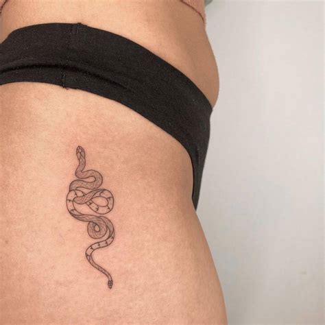 Fine Line Snake Tattoo On Hip